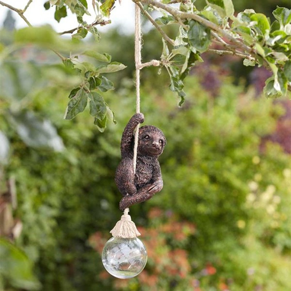 Smart Solar 34cm Swingin' Sloth Light up Glass Ball Garden Ornament ...